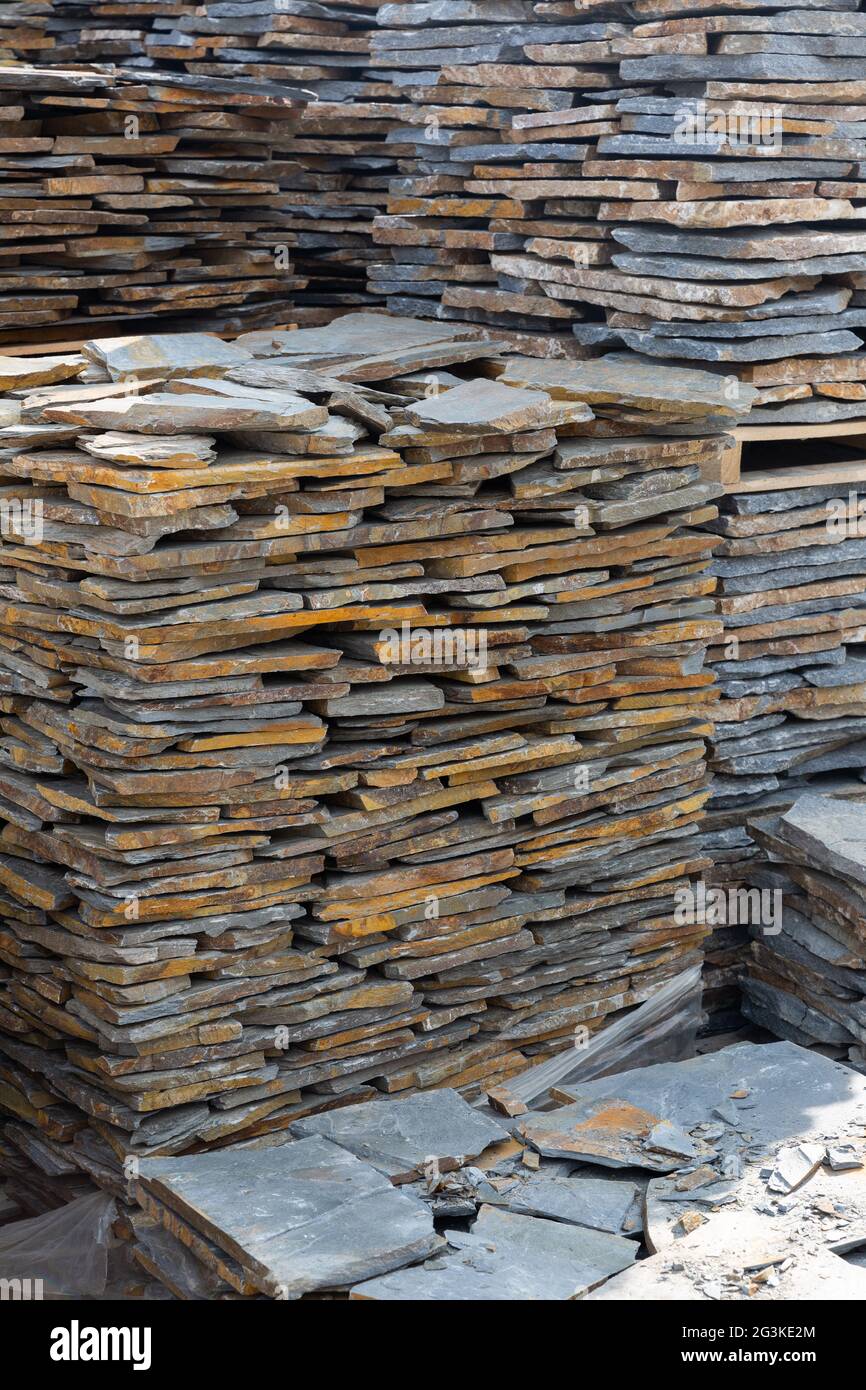 Pallets with natural stone tiles in a warehouse of brick factory Stock ...