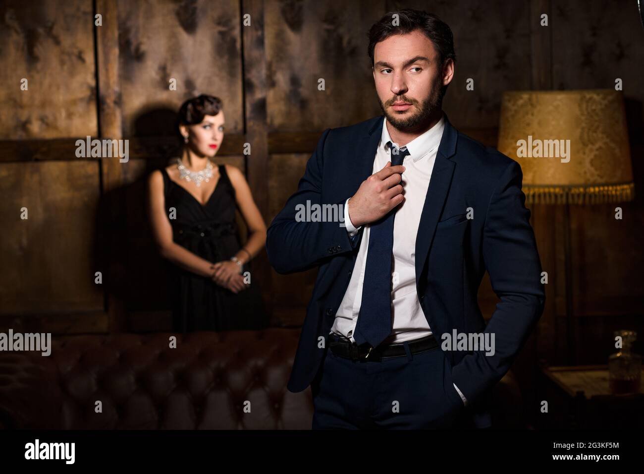 Elegant lady with rich man Stock Photo - Alamy