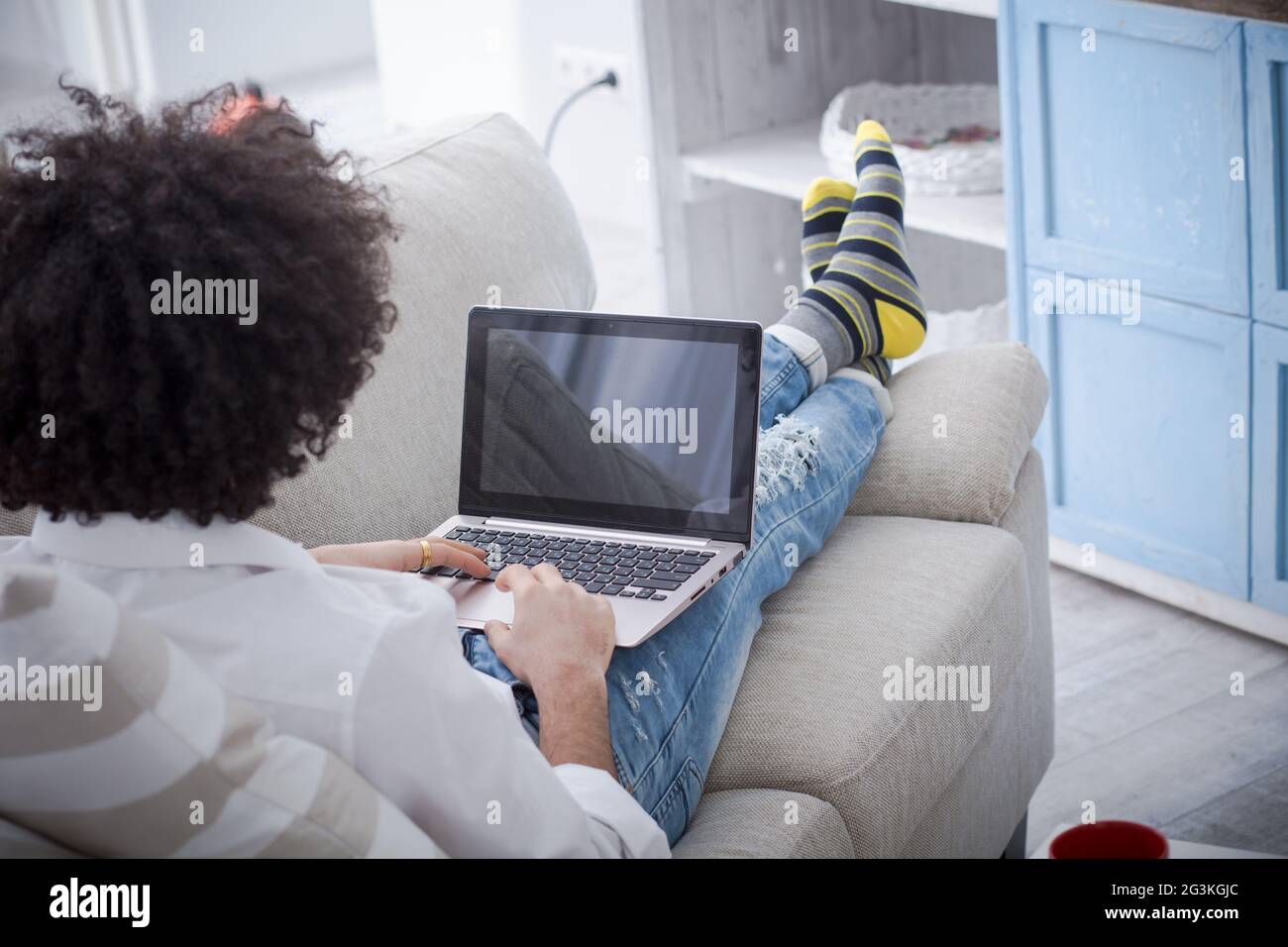 Hipster freelance man working at home Stock Photo - Alamy