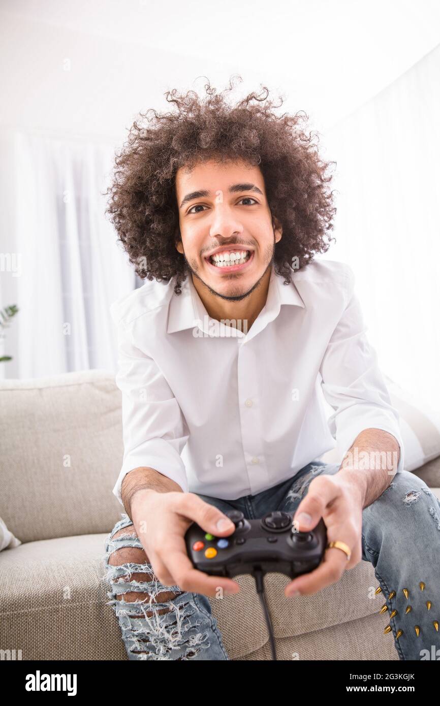 Modern person playing video games hi-res stock photography and images ...