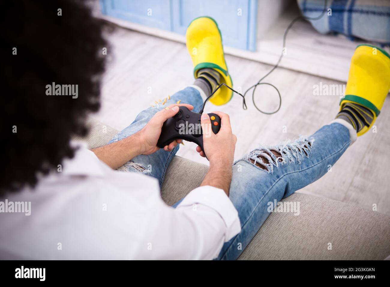 Hipster man playing computer games Stock Photo - Alamy