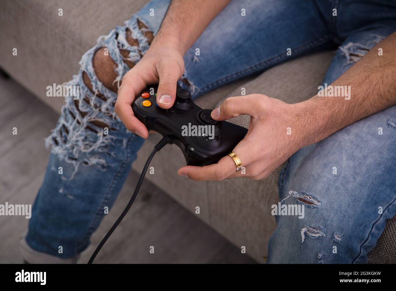 Hipster man playing computer games Stock Photo - Alamy