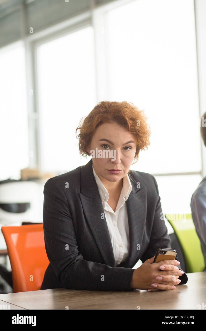 Angry business woman in office Stock Photo - Alamy
