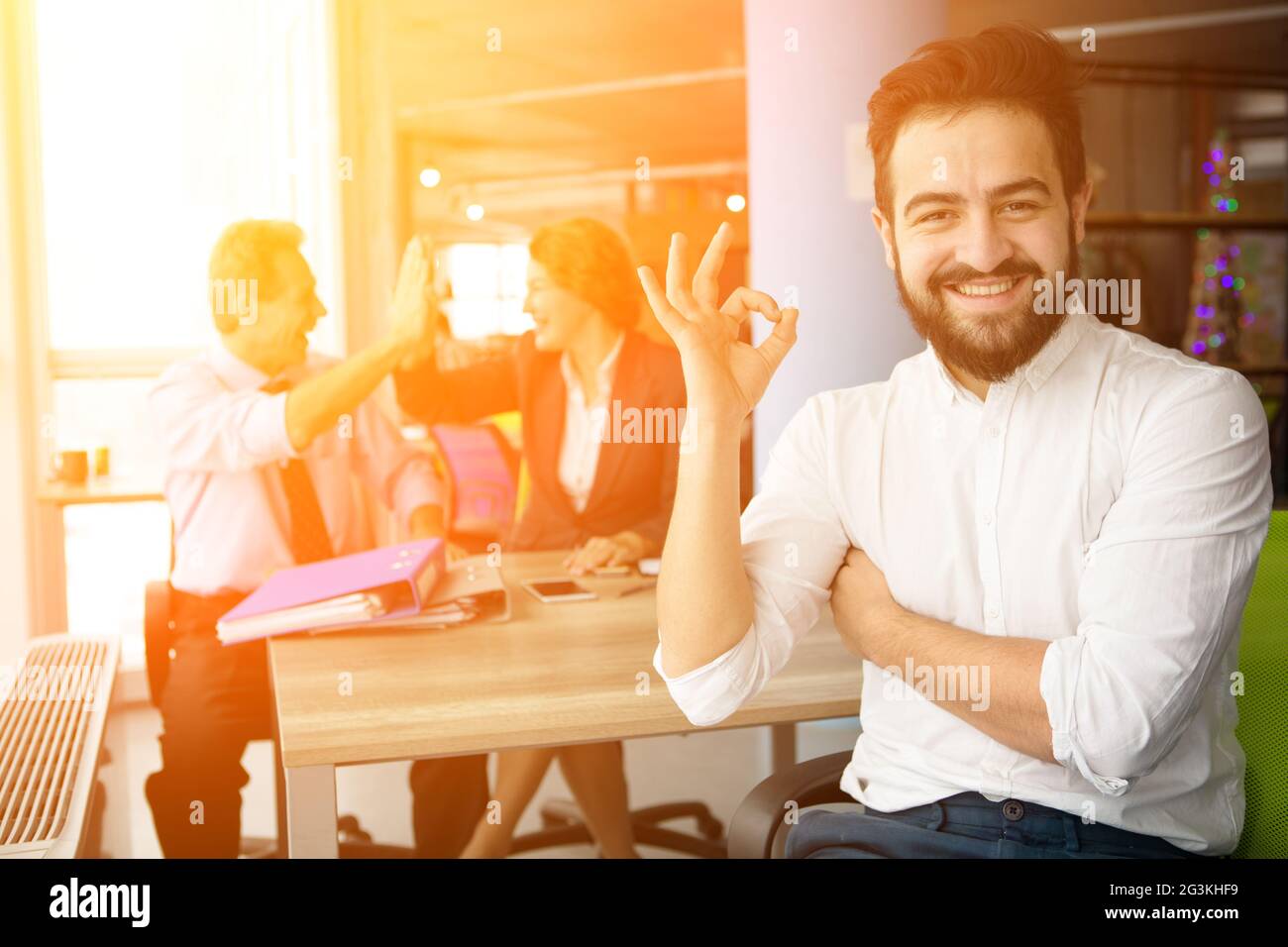 Happy interviewer in office Stock Photo - Alamy