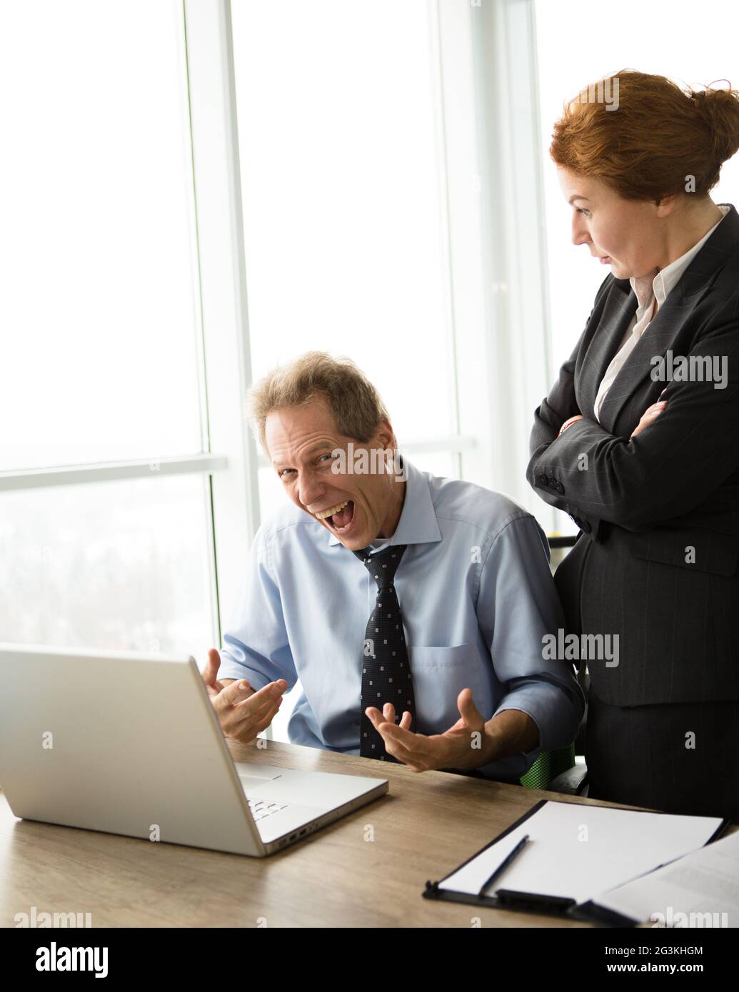 Angry boss screaming at workers Stock Photo - Alamy