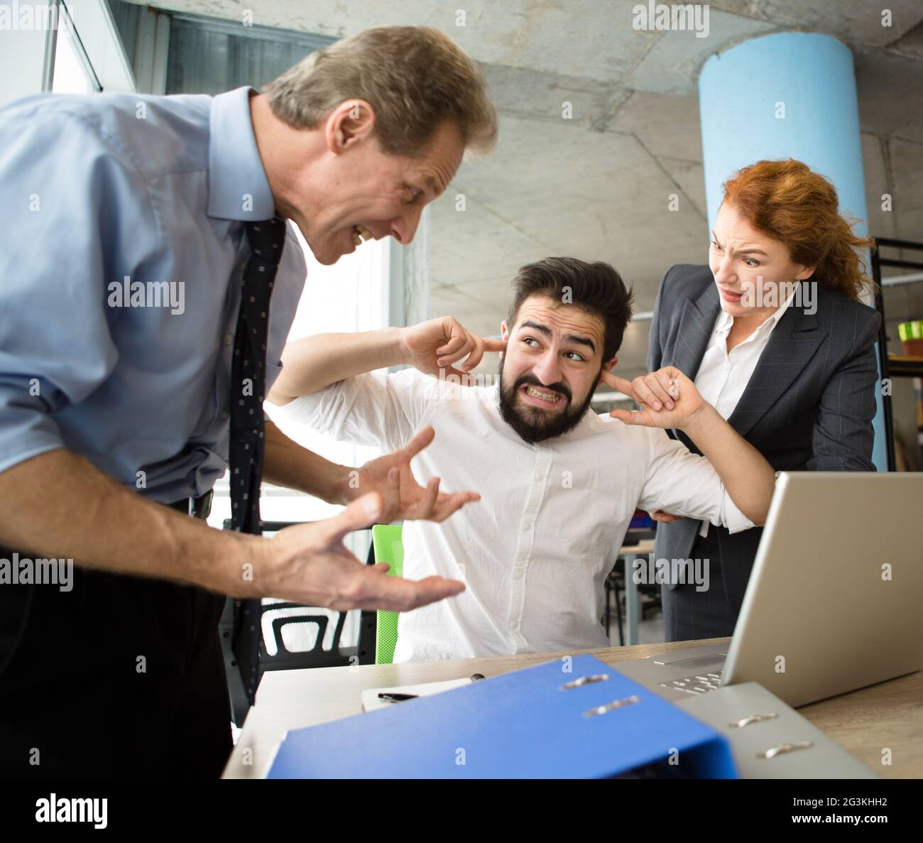 Angry boss screaming at workers Stock Photo - Alamy