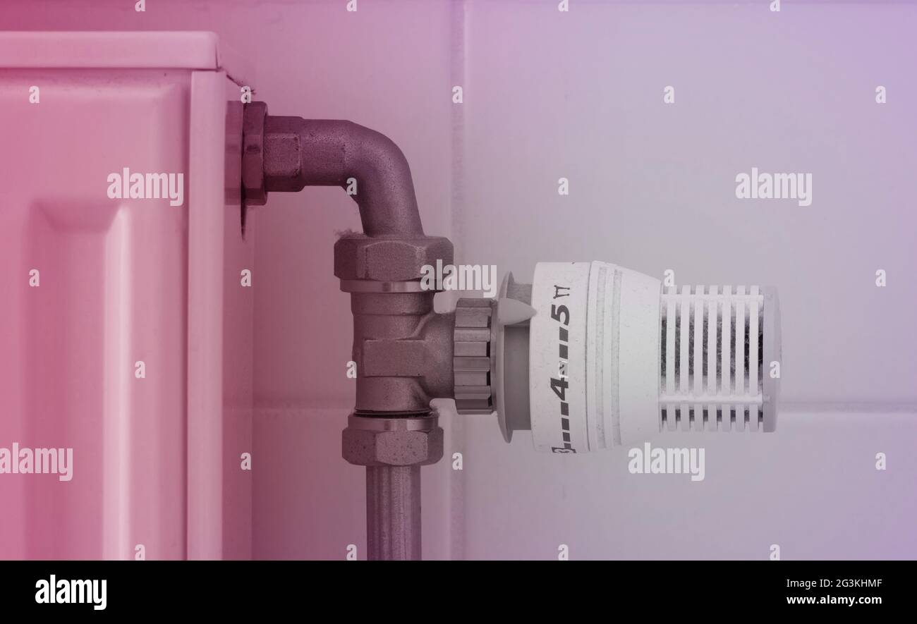 Temperature knob of heating radiator, used and dusty Stock Photo - Alamy