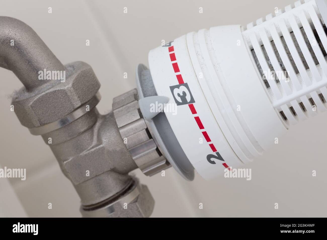 Temperature knob of heating radiator, used and dusty Stock Photo - Alamy