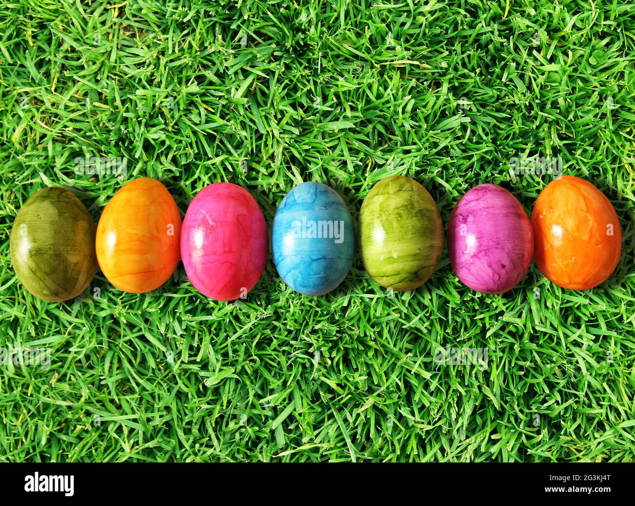 Easter eggs on grass Stock Photo - Alamy