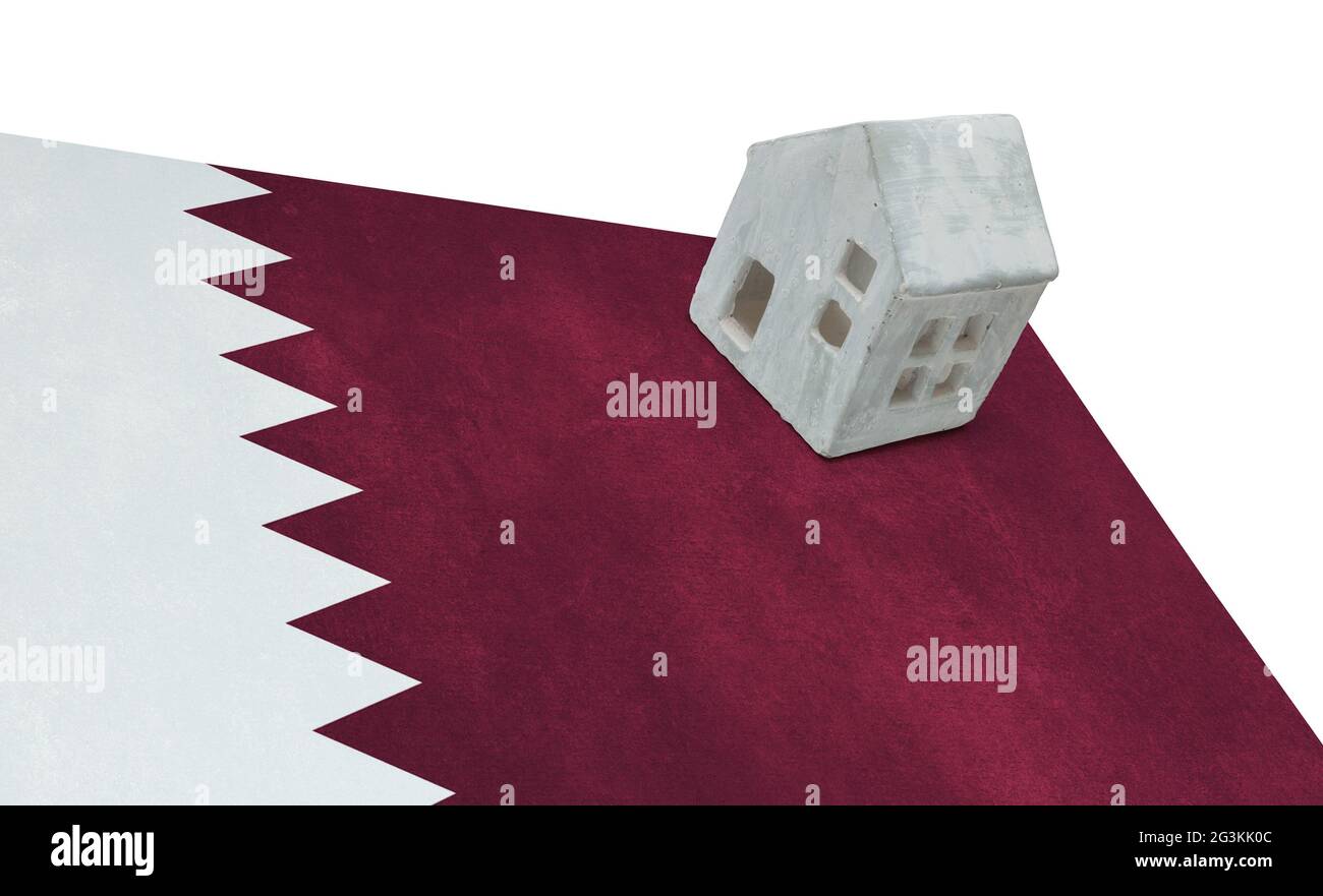 Small house on a flag - Qatar Stock Photo - Alamy