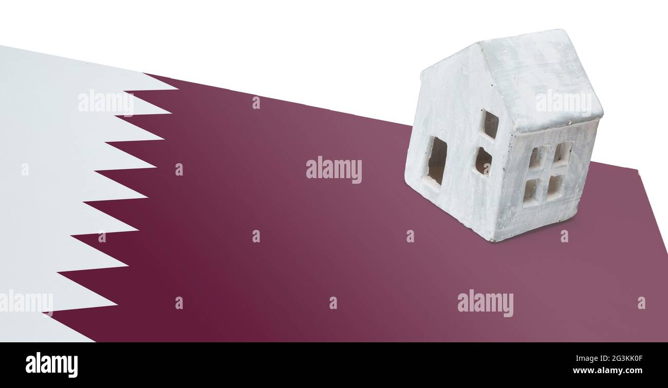 Small house on a flag - Qatar Stock Photo - Alamy
