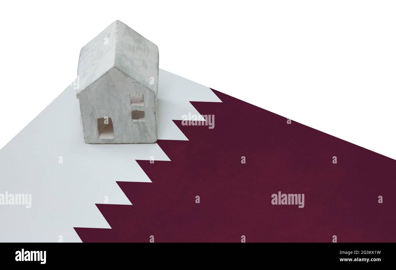 Small house on a flag - Qatar Stock Photo - Alamy