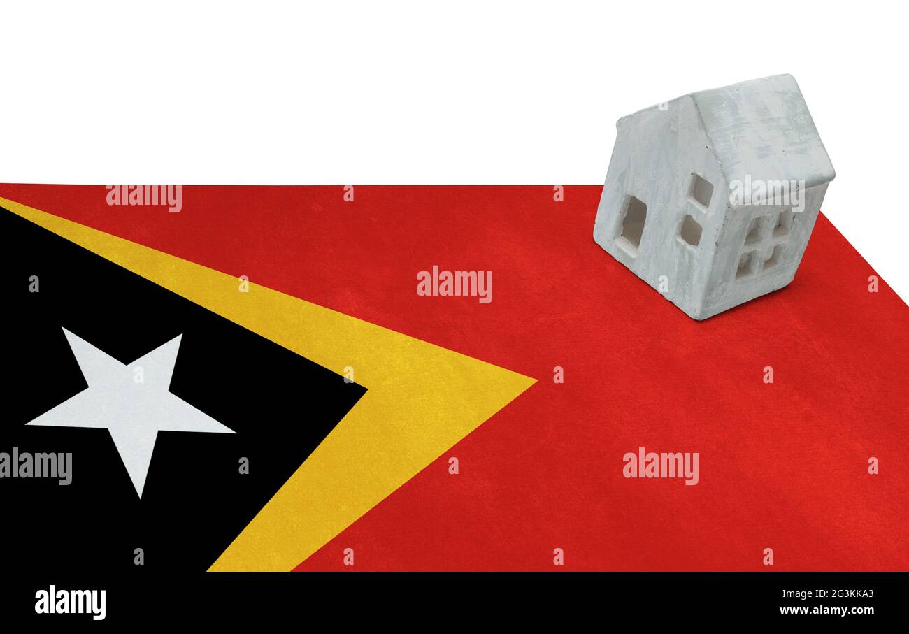 Small house on a flag - East Timor Stock Photo - Alamy
