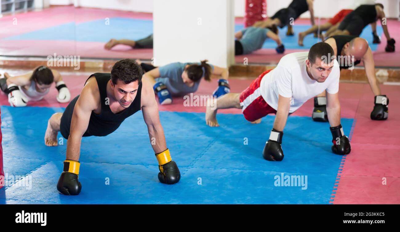 Group of active people of different ages training Stock Photo - Alamy