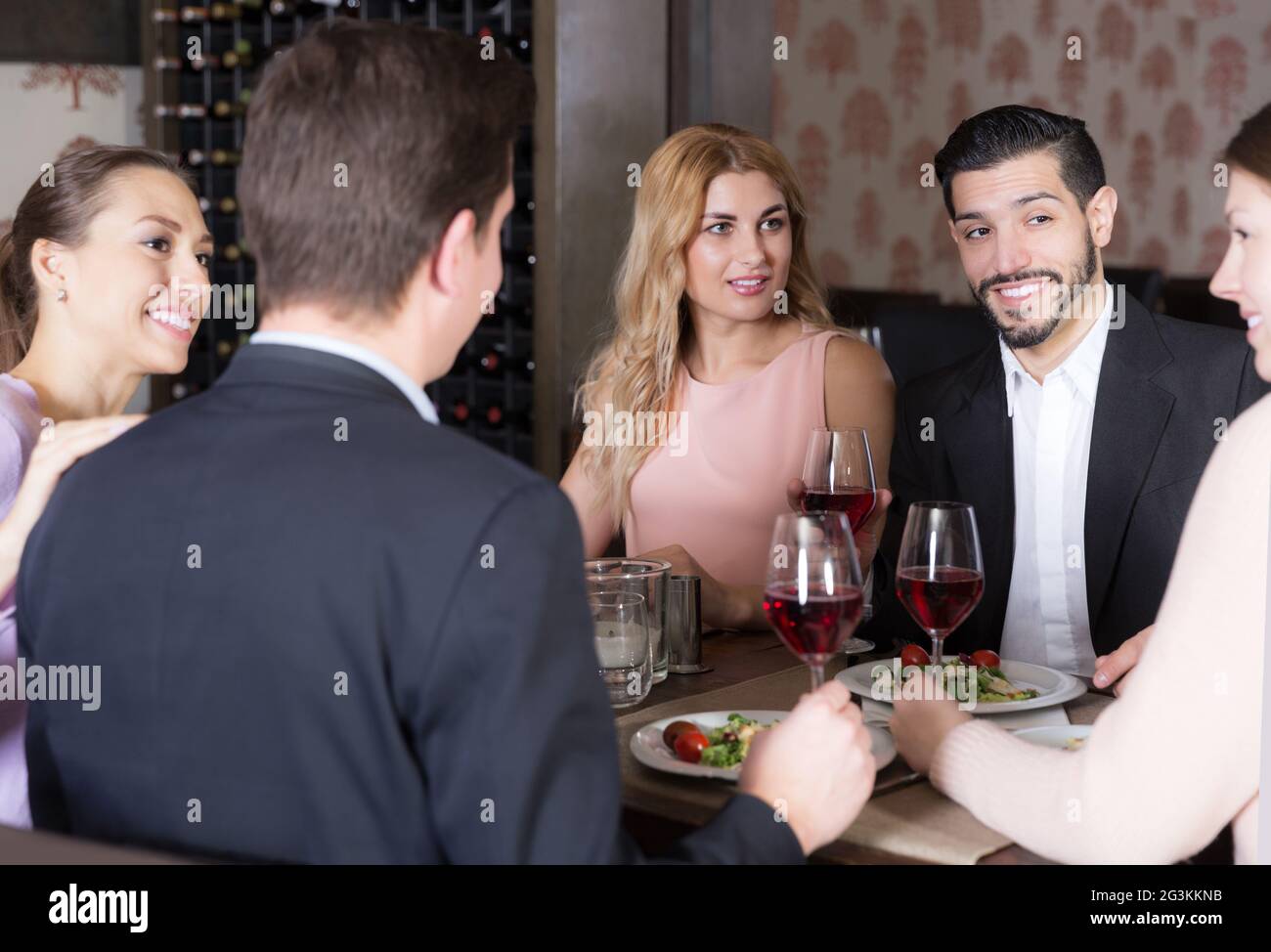 Friendly meeting over dinner with wine Stock Photo - Alamy