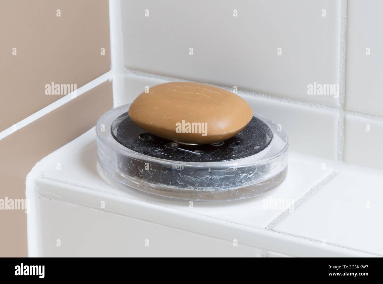 Used brown soap in a bathroom Stock Photo - Alamy