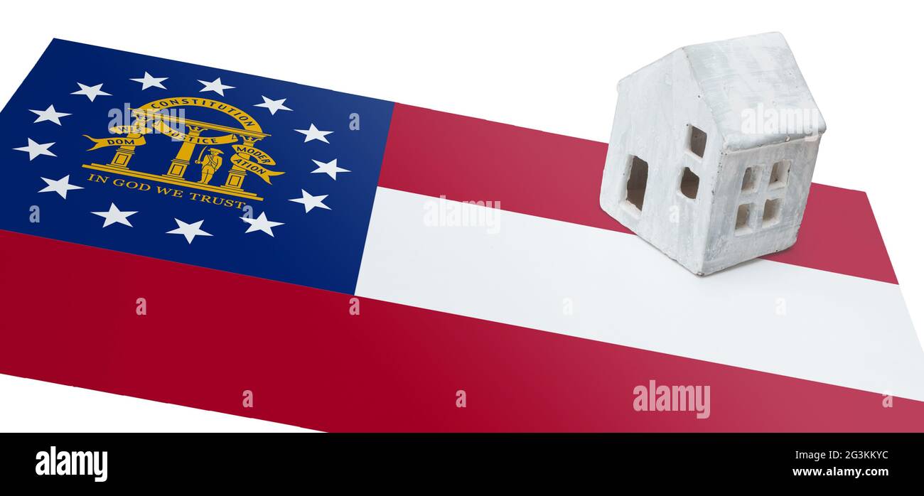 Small house on a flag - Georgia Stock Photo - Alamy