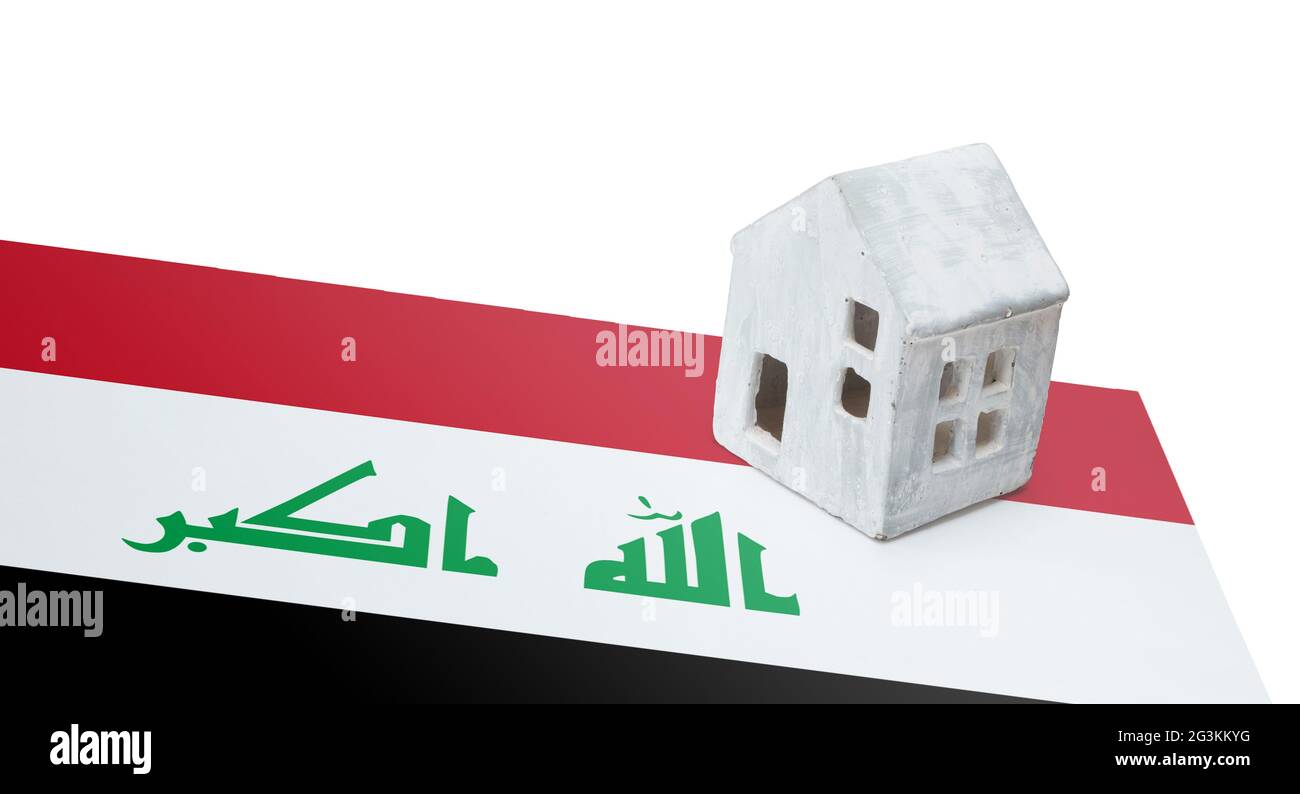 Small house on a flag - Iraq Stock Photo - Alamy