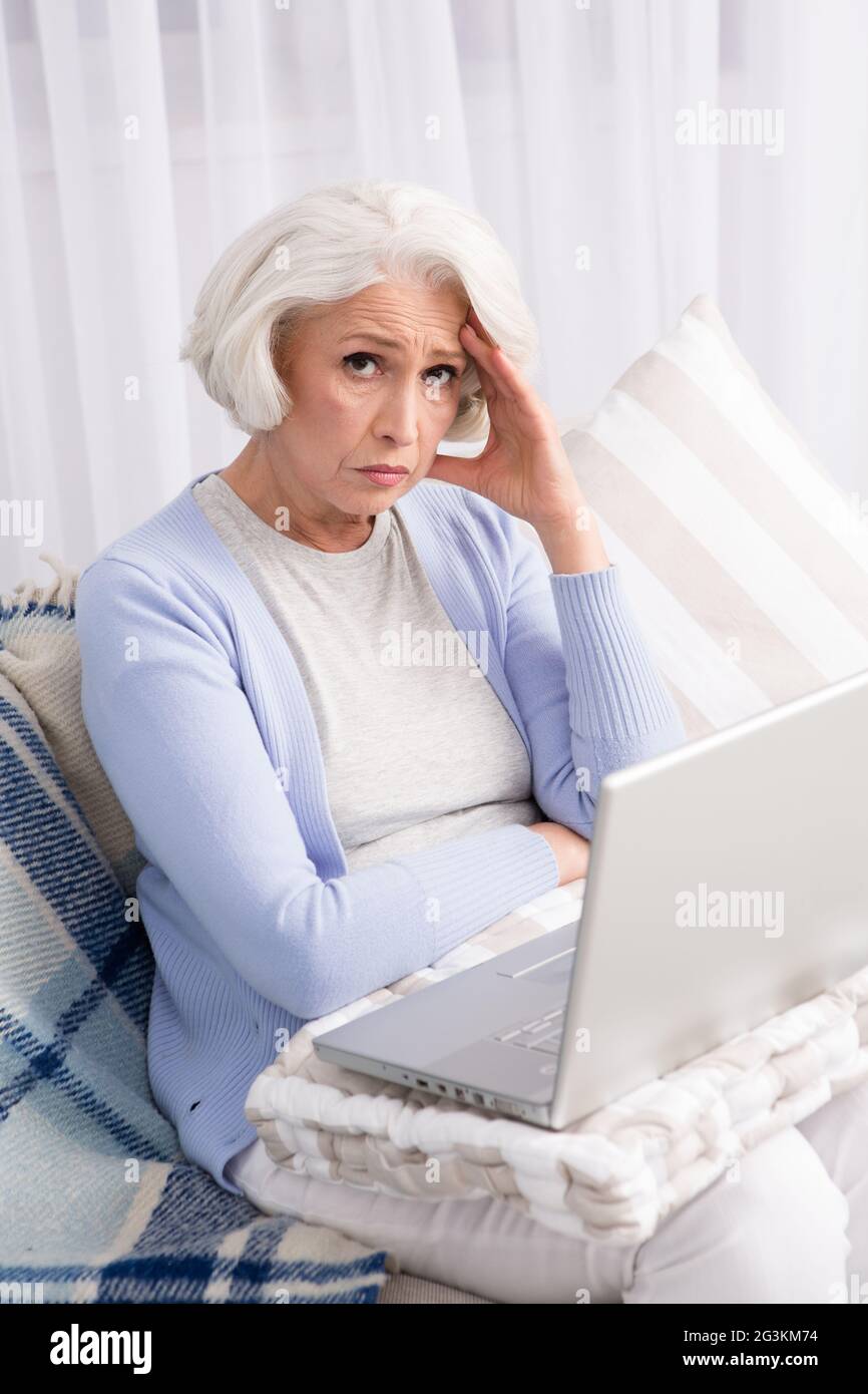 Grandmother using laptop computer Stock Photo - Alamy