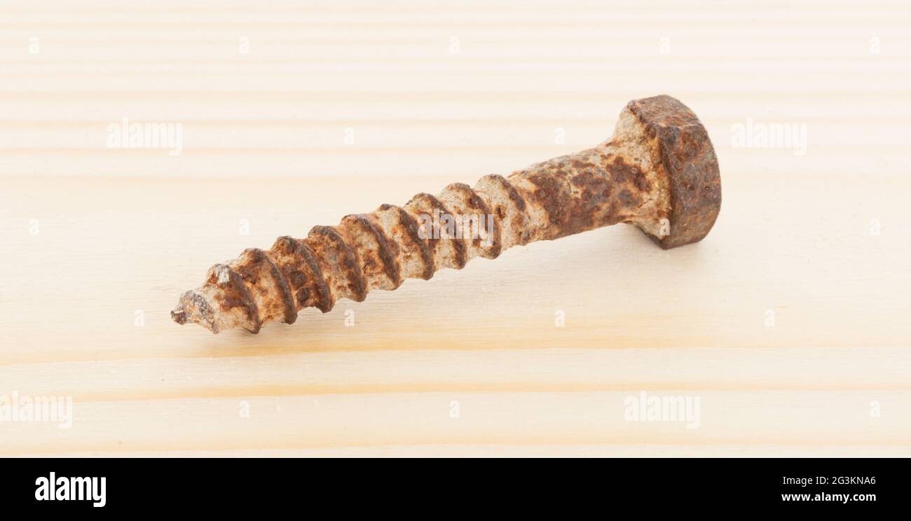 Rusted old screw isolated Stock Photo - Alamy