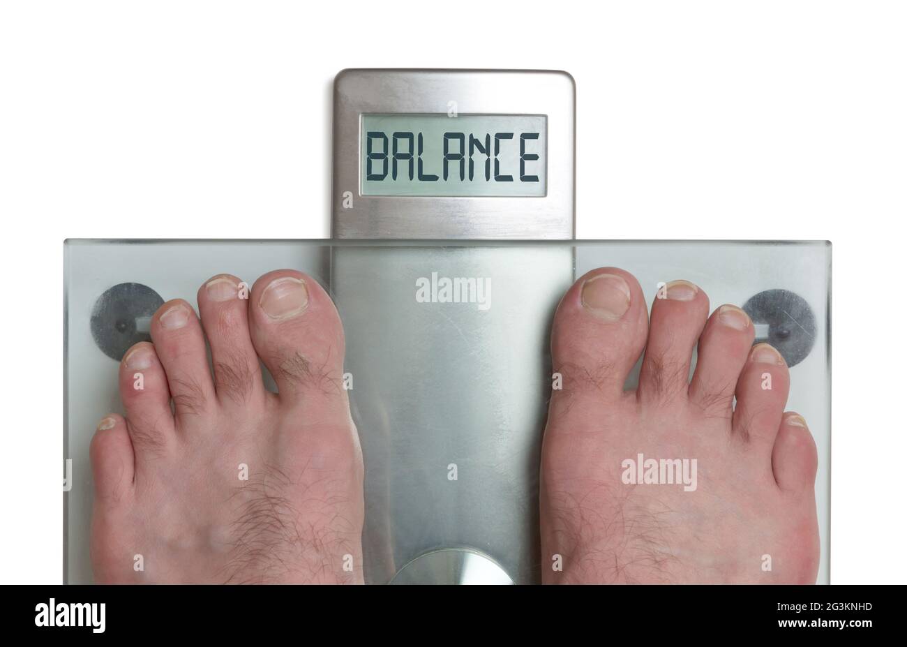 Man's feet on weight scale - Balance Stock Photo - Alamy