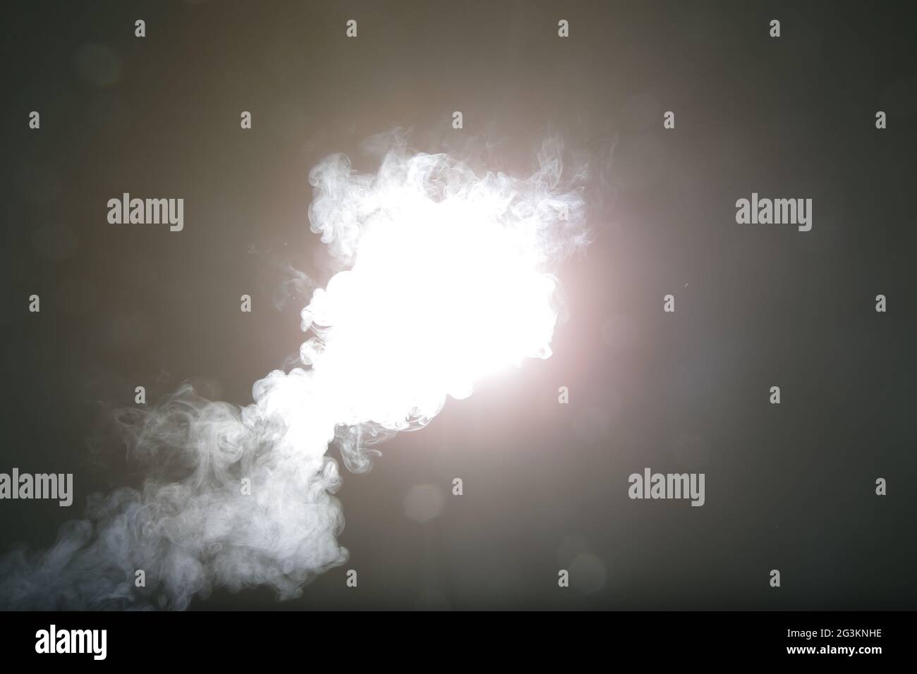 Artificial magic light illuminates smoke isolated on dark background ...