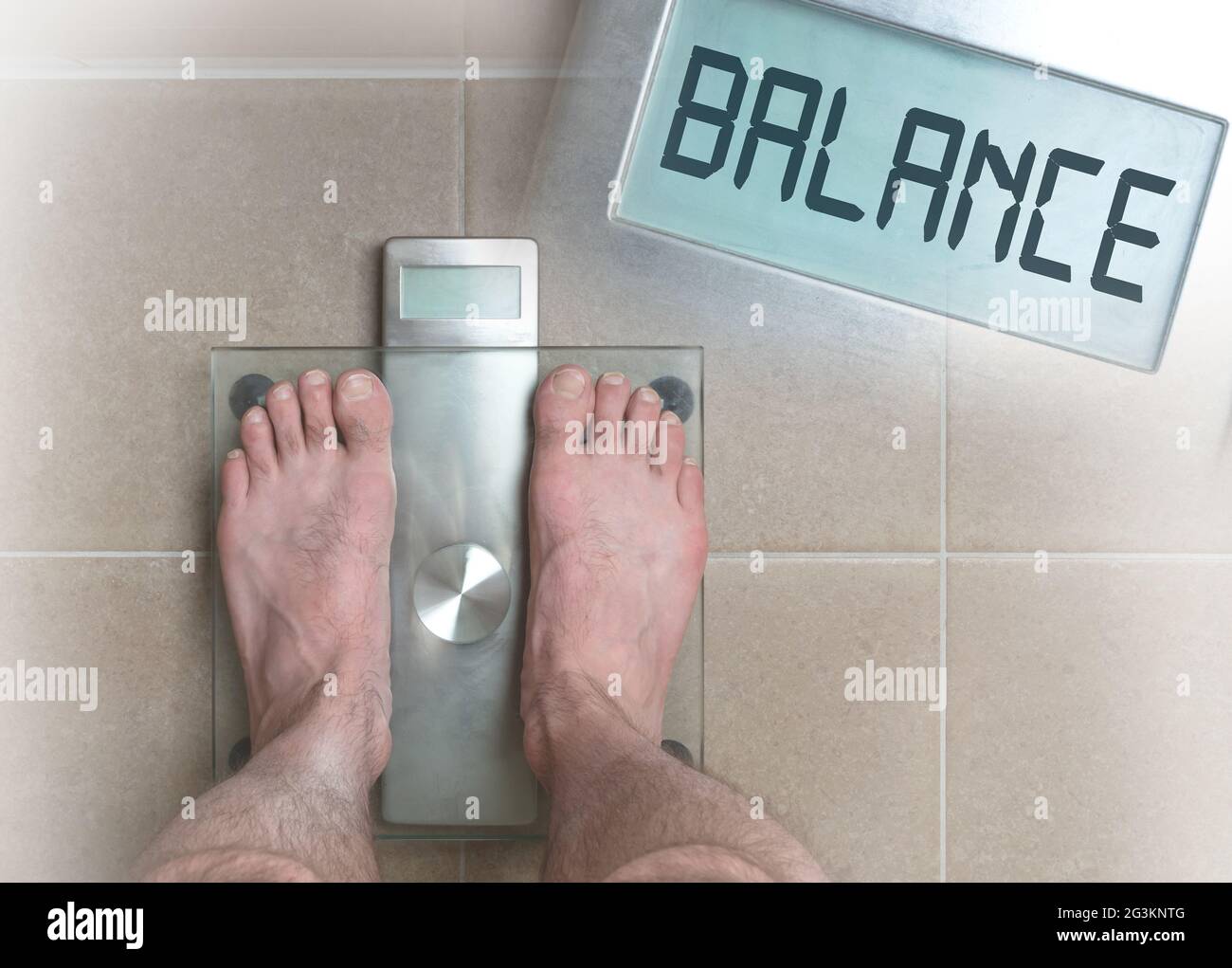 Man's feet on weight scale - Balance Stock Photo - Alamy