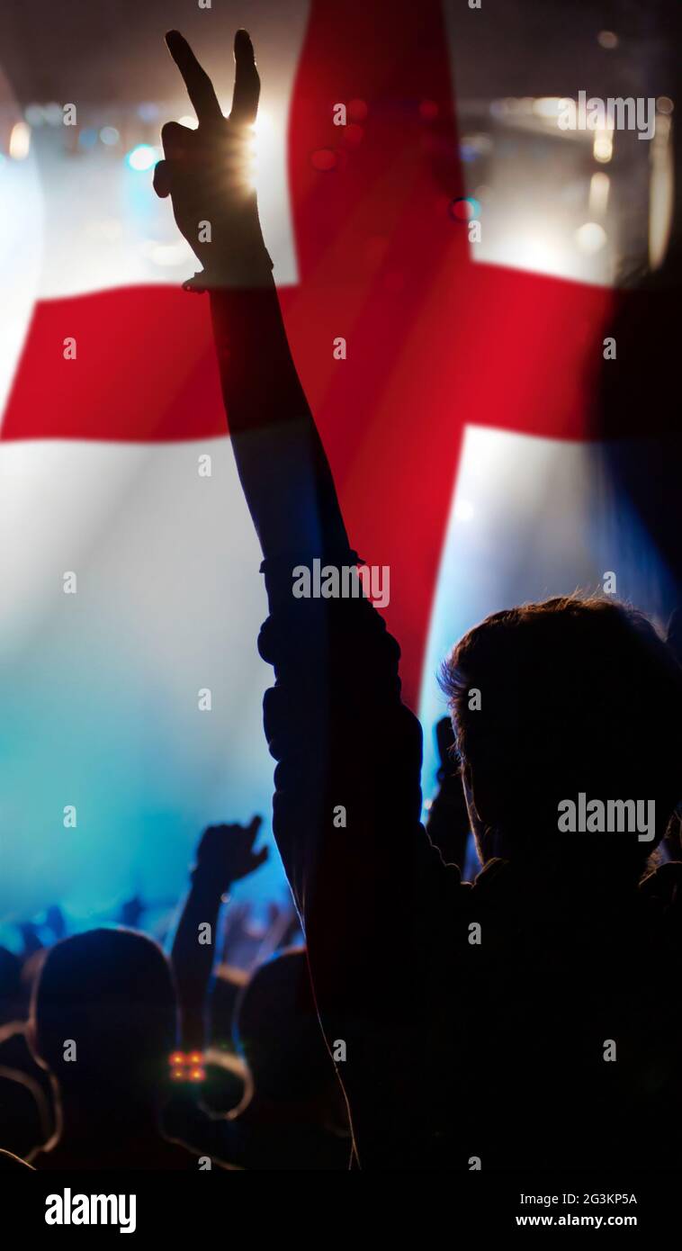 Soccer fans supporting England - crowd celebrating in stadium with ...