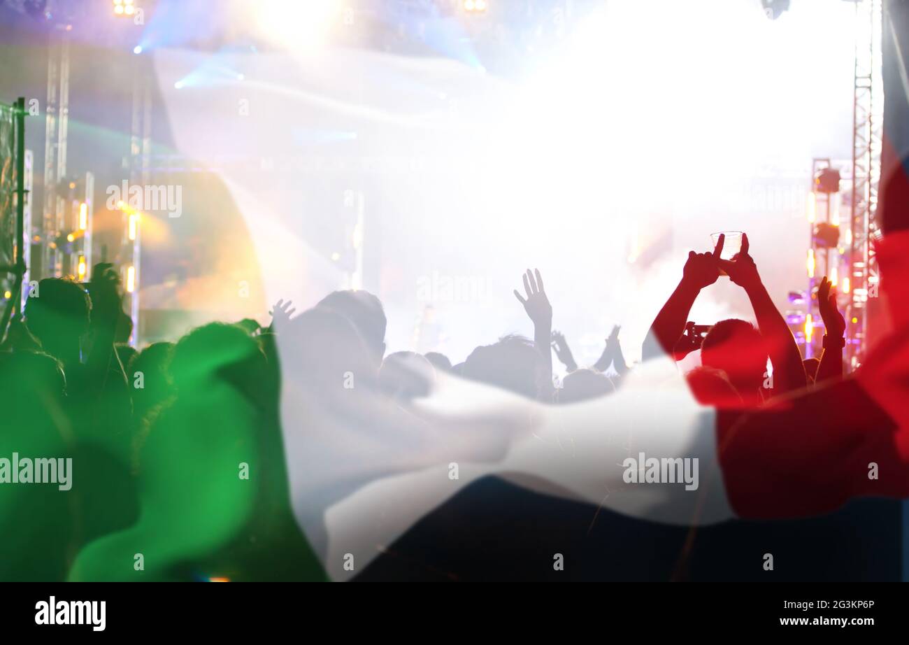 Soccer fans supporting Italy - crowd celebrating in stadium with raised ...