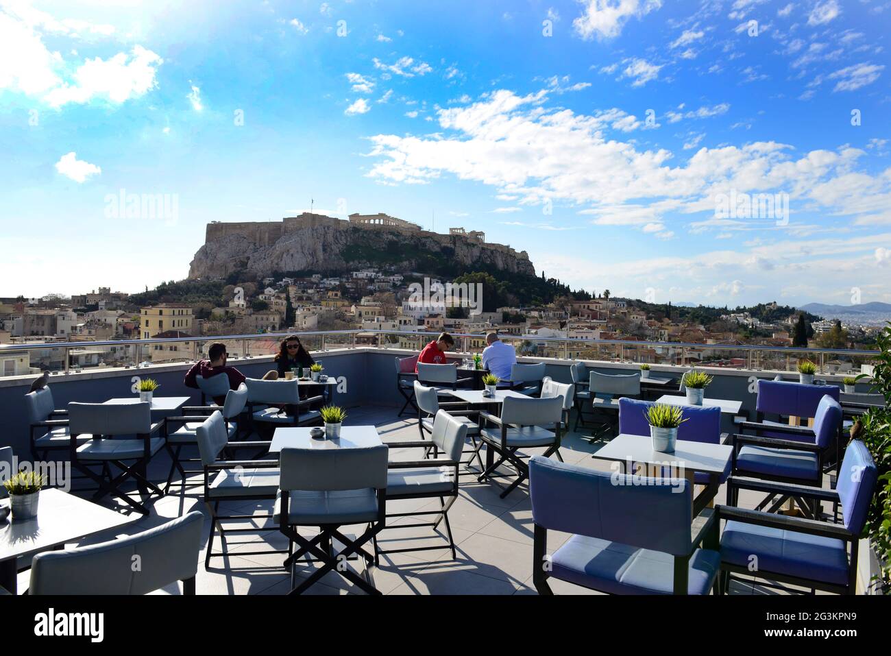 A rooftop view of the Acropolis and the old town in Athens, Greece ...