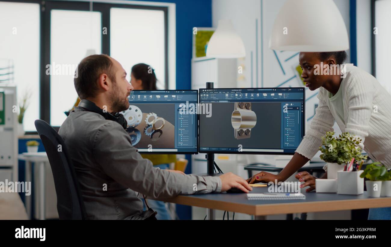 Industrial engineer and african project manager working on 3D ...