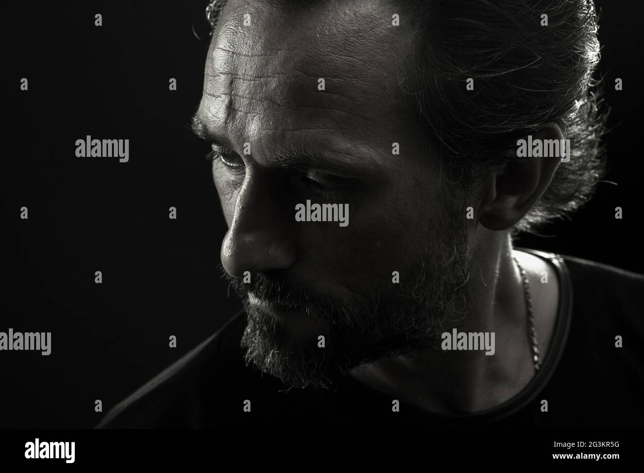 Male face looking left hi-res stock photography and images - Alamy