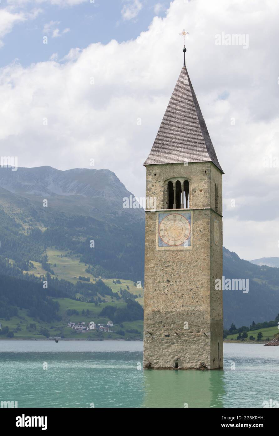 Submerged tower of reschensee church deep in Resias Lake in Trentino ...