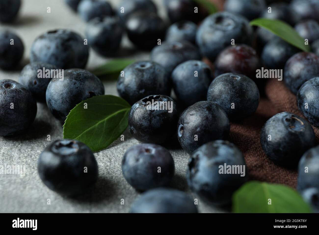 Fresh berry concept with blueberry on gray textured table Stock Photo ...