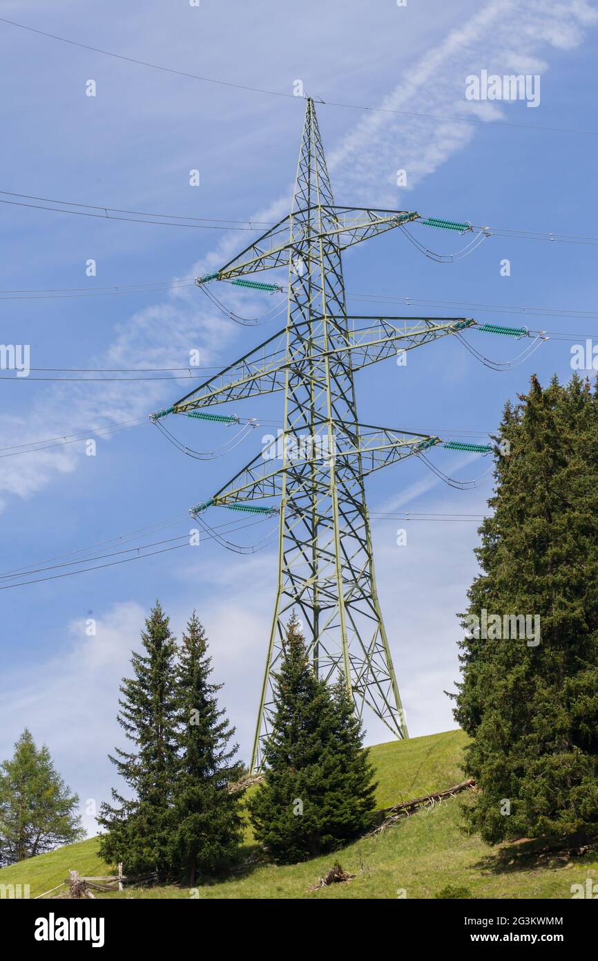 Large electric pylon in the Alps Stock Photo - Alamy