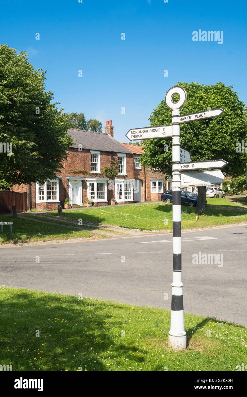 Old cast iron road sign hi-res stock photography and images - Alamy