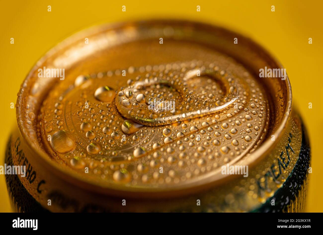 condensate on a cold metal beer can on a yellow background Stock Photo ...