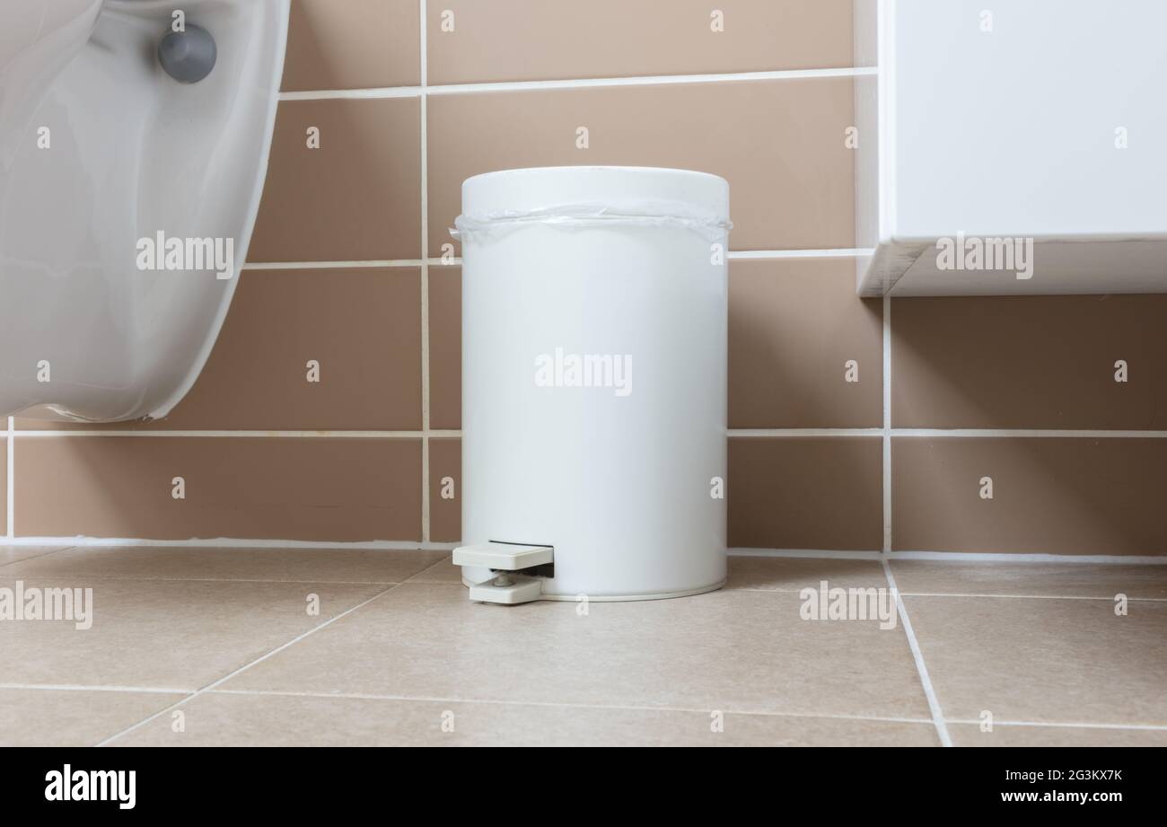Trash bin in bathroom Stock Photo - Alamy
