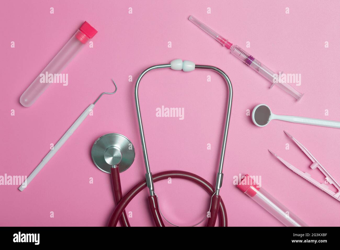 Medical instruments, devices and items on the colored table in the ...