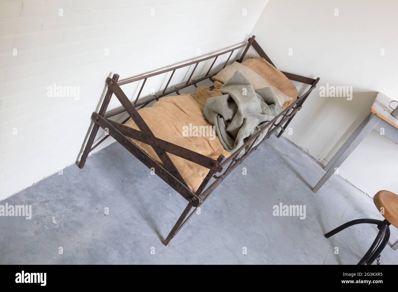 Bed in old dutch jail Stock Photo - Alamy
