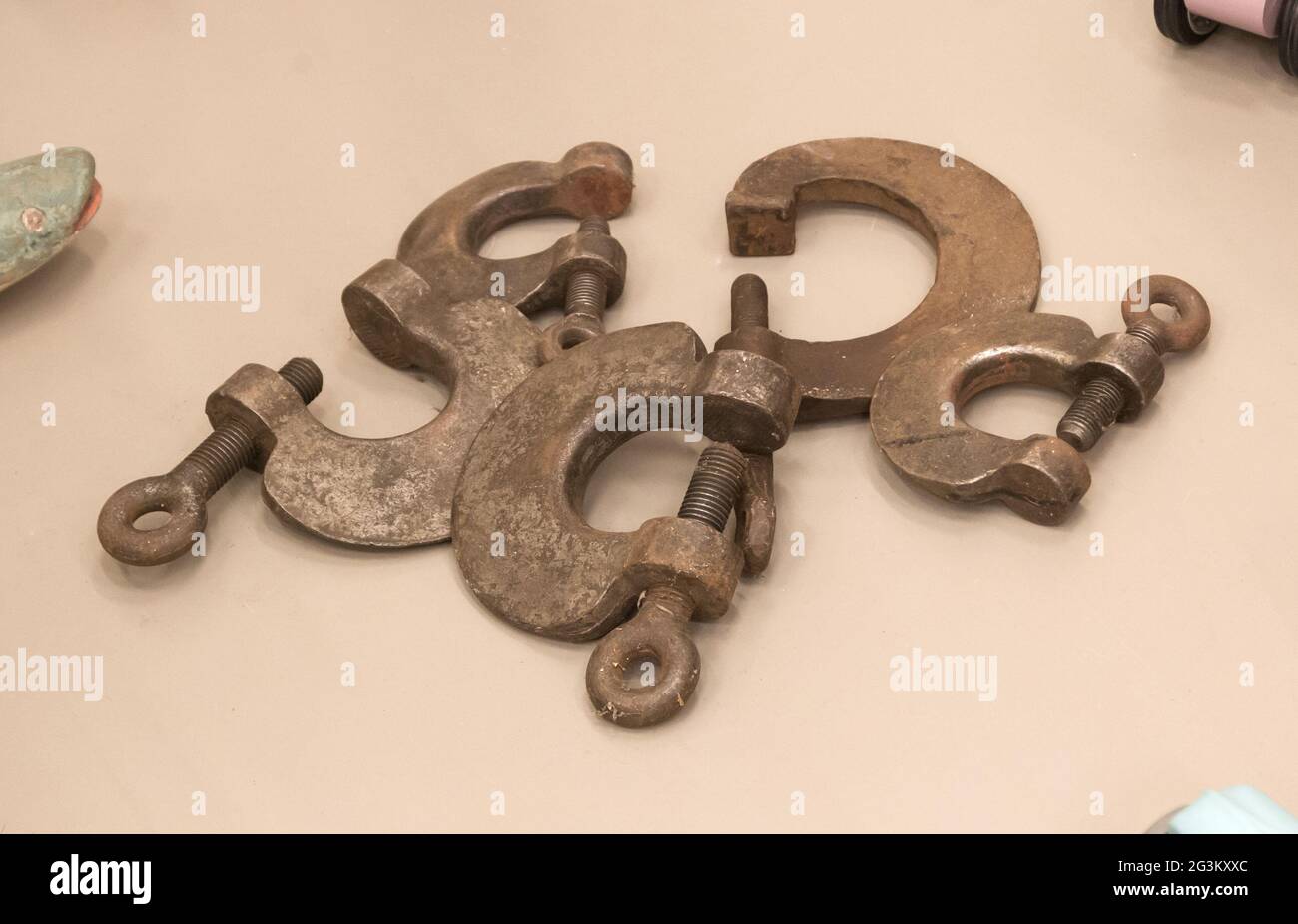 Collection of rusty metal clamps Stock Photo - Alamy