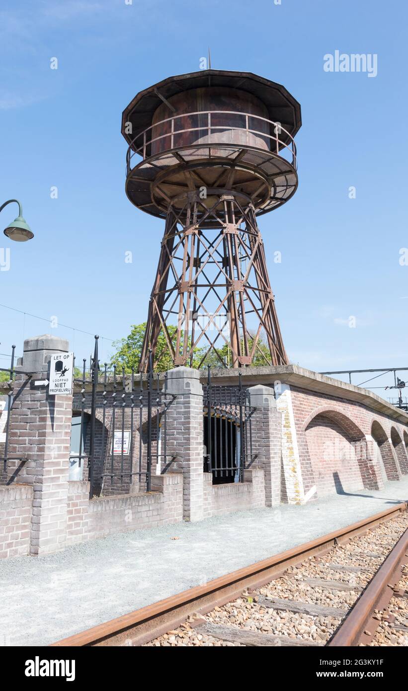 Old water tower at a railway station Stock Photo - Alamy