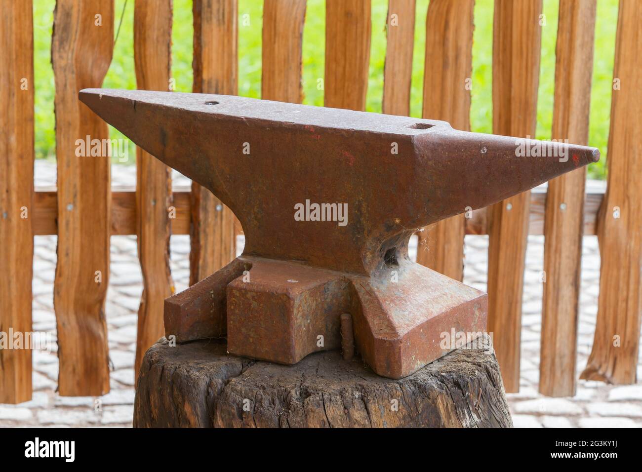 Old rusty rugged anvil Stock Photo - Alamy