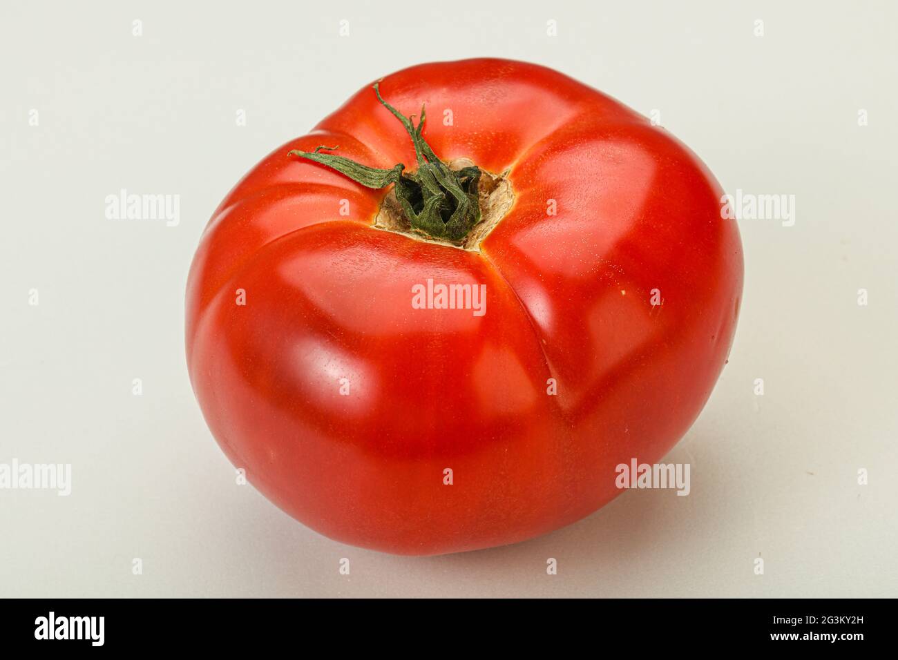 Ripe big juicy red tomato for cooking Stock Photo - Alamy