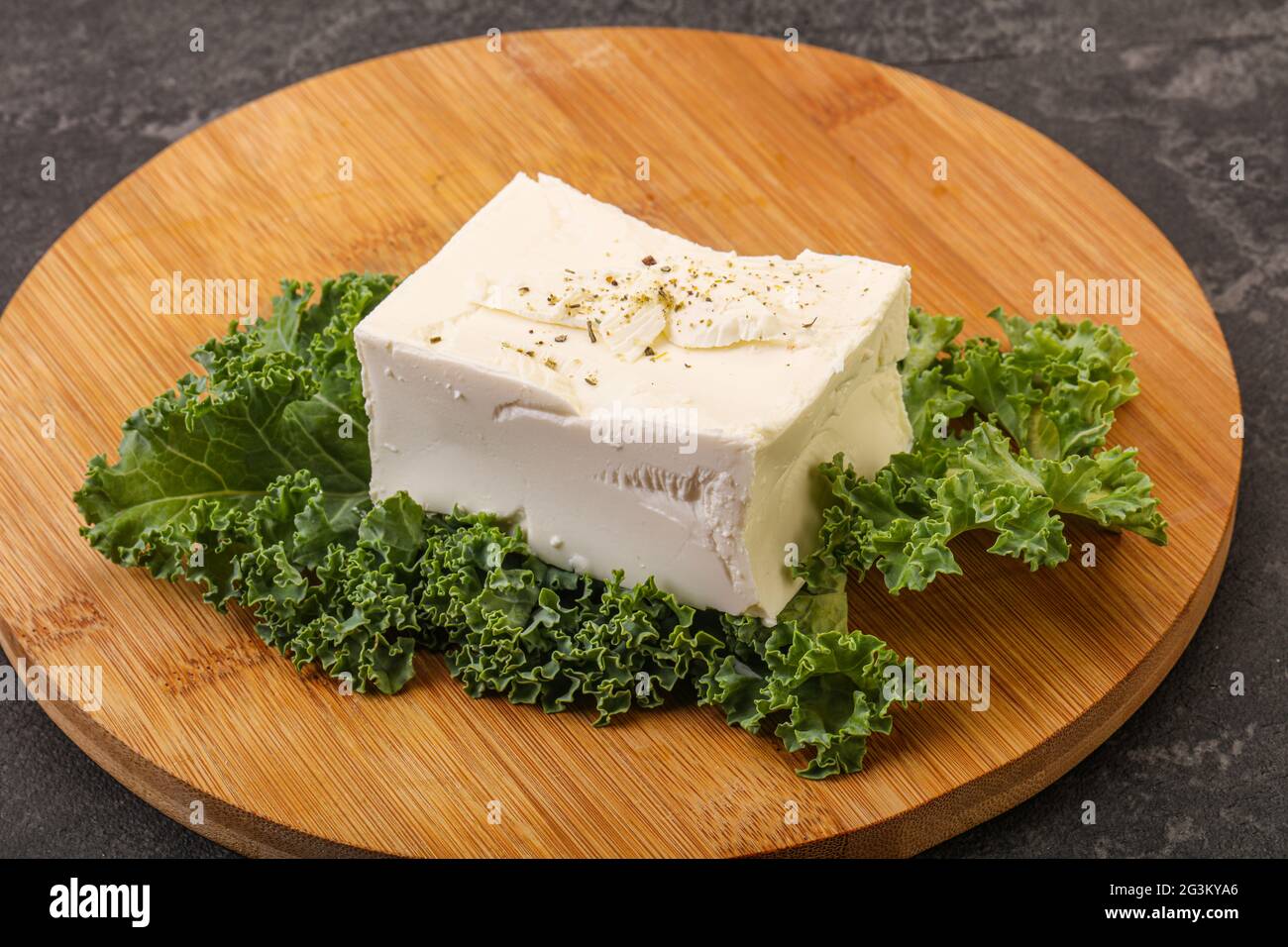 Traditional tasty Greek Feta soft cheese brick Stock Photo - Alamy