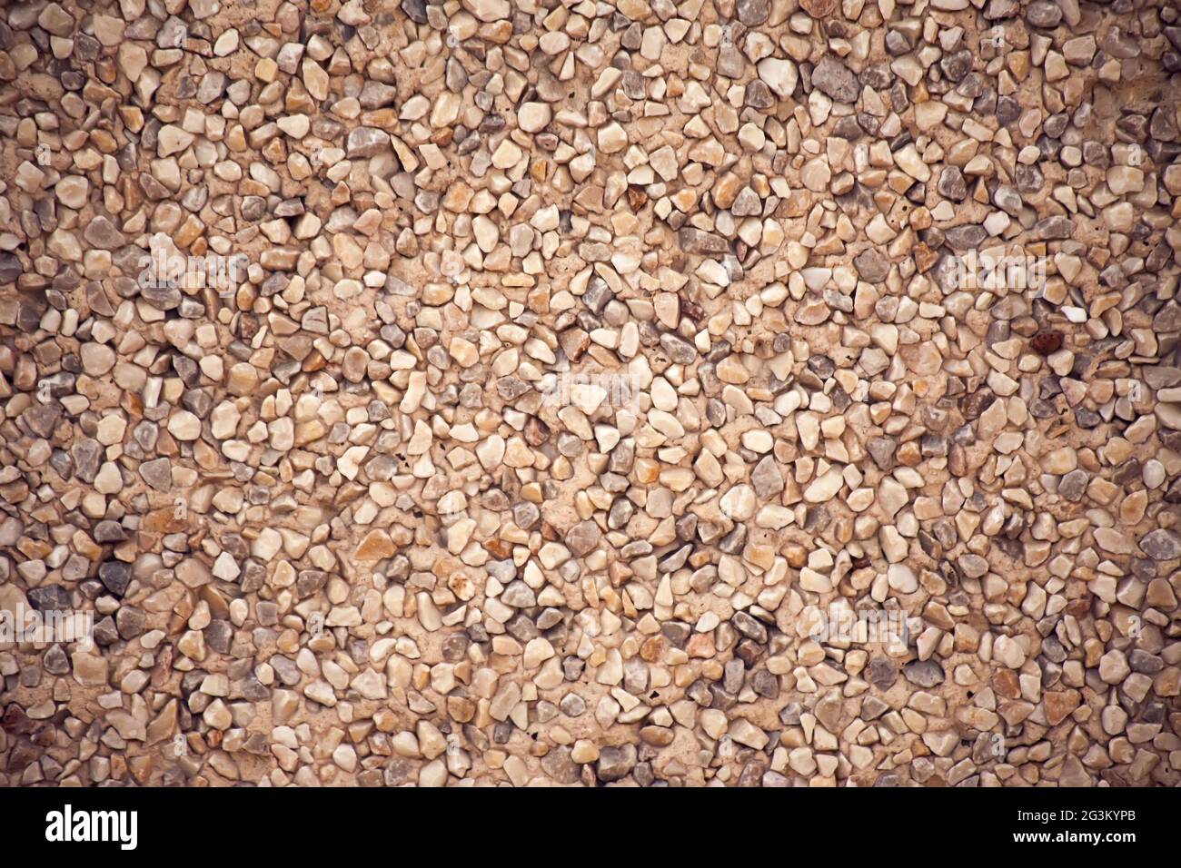 Small stones texture wall. Natural background. Close up shot Stock ...