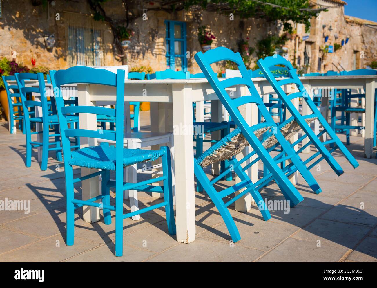 Tables in a traditional Italian Restaurant in Sicily Stock Photo - Alamy