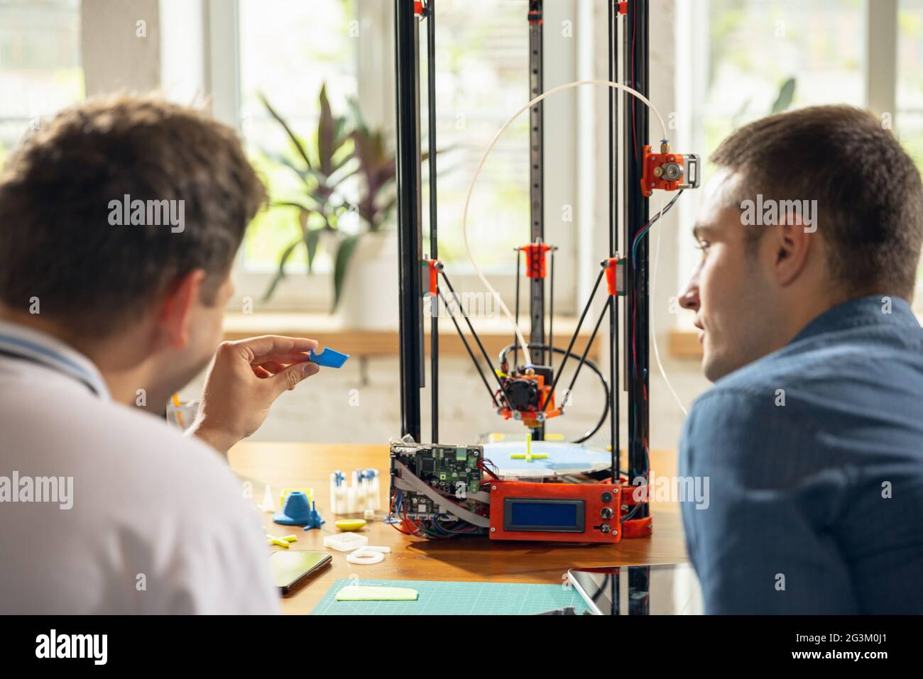 New generation of 3D Printing Machine printing a piece of plastic. For ...