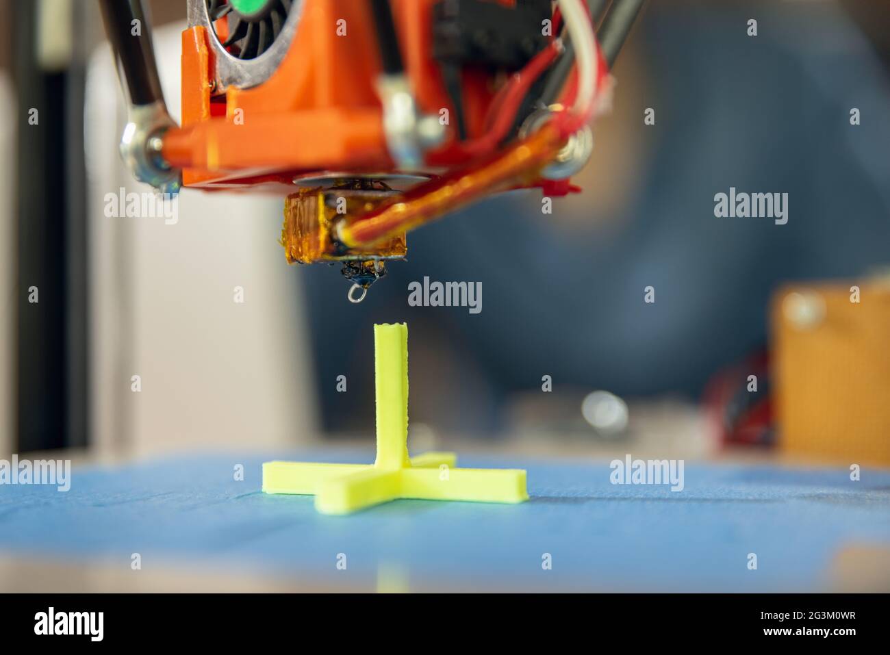 New generation of 3D Printing Machine printing a piece of plastic. For ...