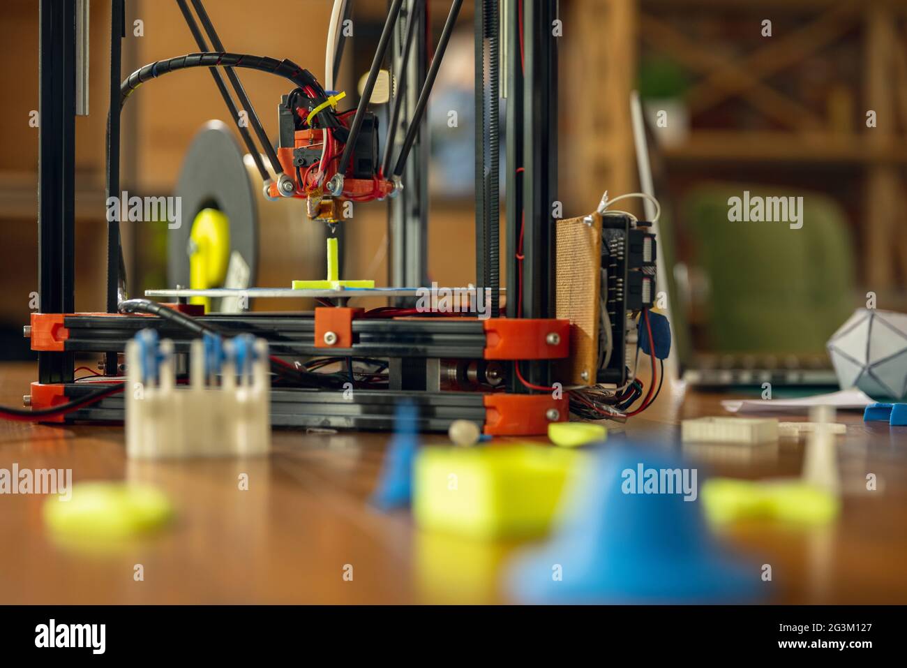 New generation of 3D Printing Machine printing a piece of plastic. For ...